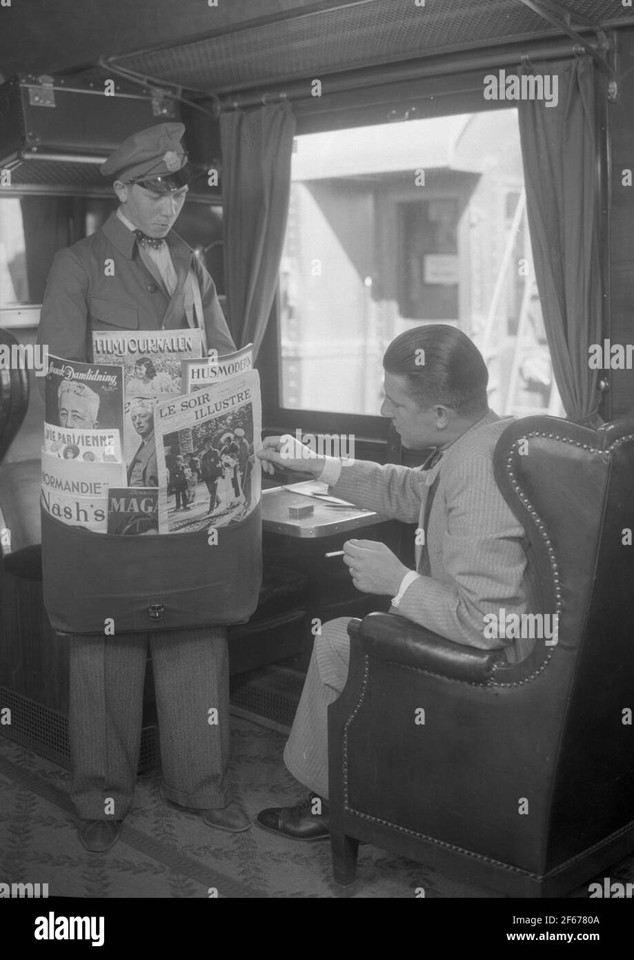 Newspaper sales on train, state railways, SJ BO5B Stock Photo - Alamy