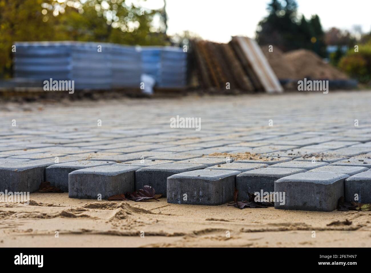 new pavement of paving slabs, new street being paved Stock Photo - Alamy