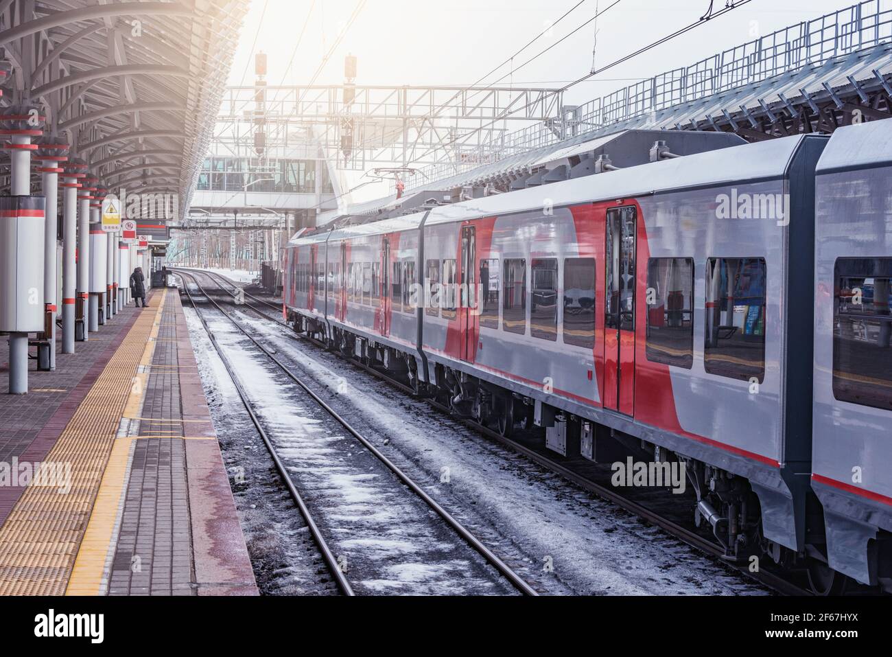 Highspeed train by the station platform at winter day Stock Photo - Alamy