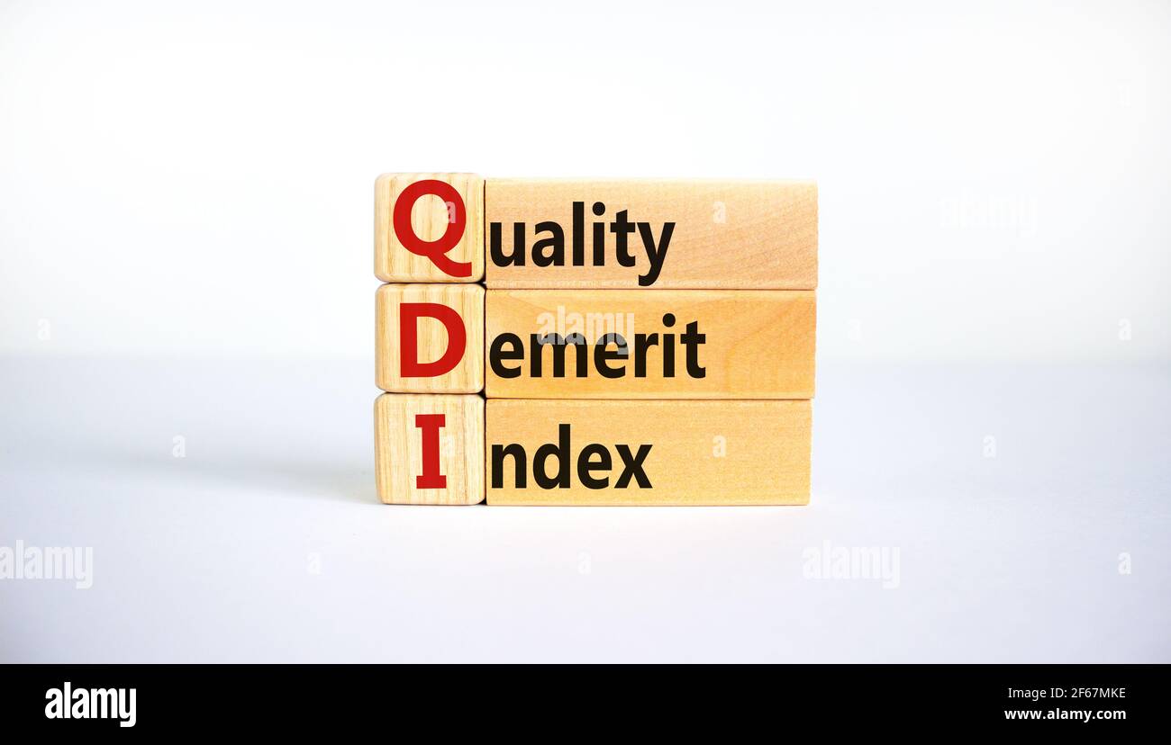QDI, quality demerit index symbol. Wooden blocks with words 'QDI ...