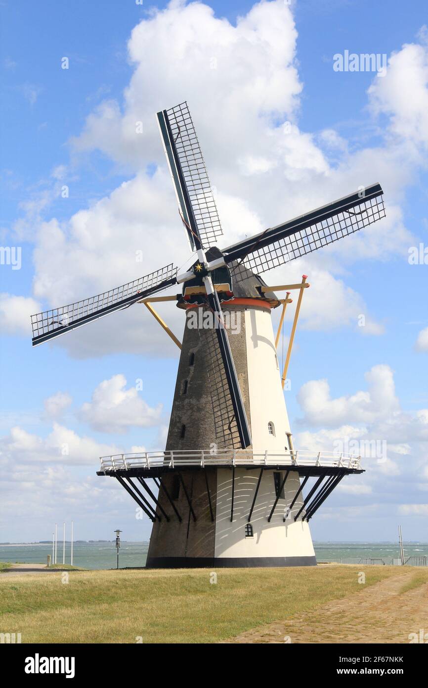 A beautiful old historic windmill, with four wings Stock Photo - Alamy