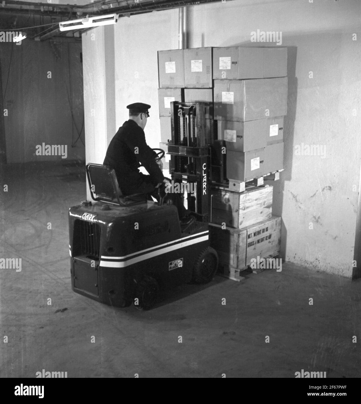 Goods handling with truck Stock Photo - Alamy