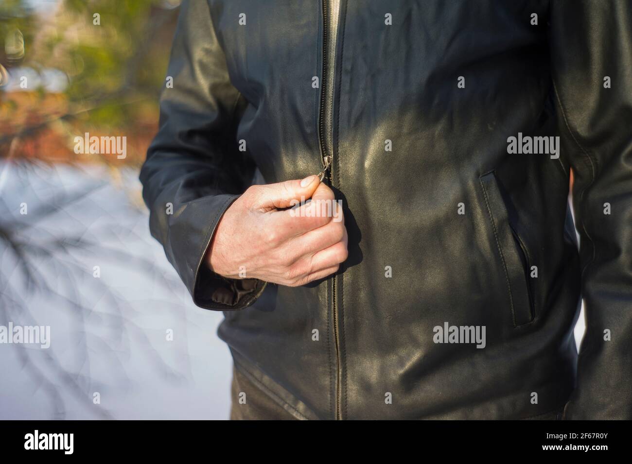 Unzipping jacket hi-res stock photography and images - Alamy