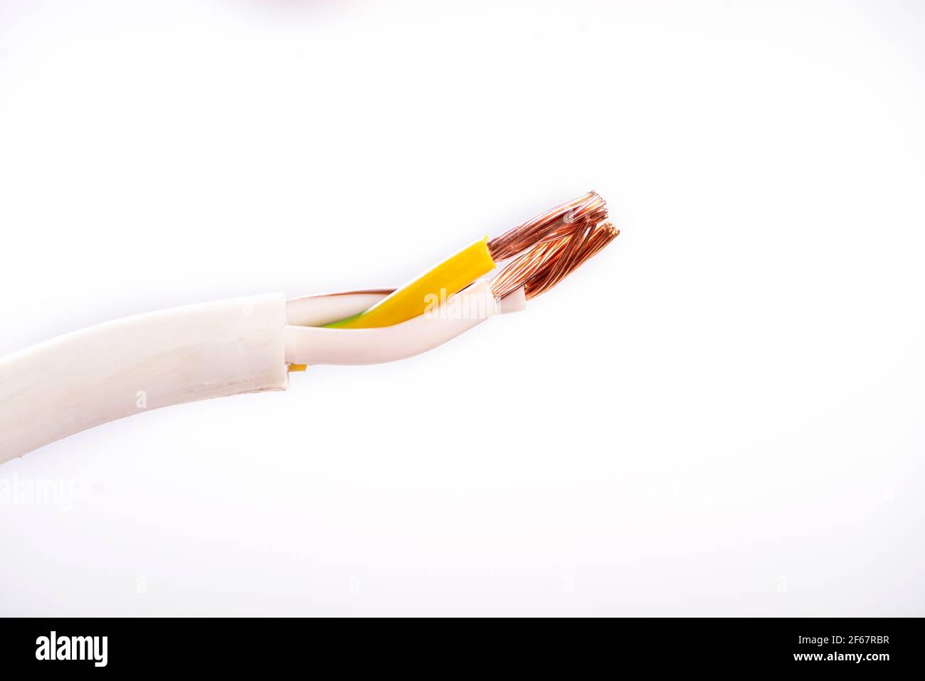 Electric cable without insulation, on a blue background with place for ...