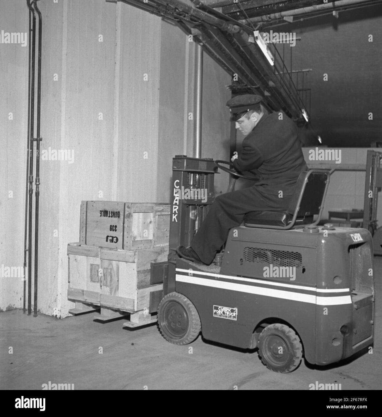 Goods handling with truck Stock Photo - Alamy