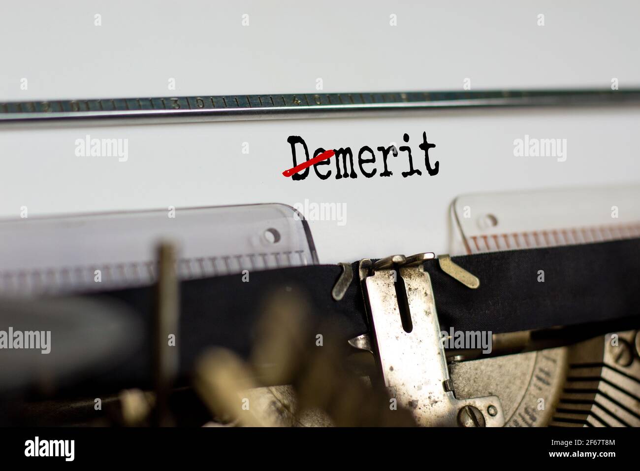 Demerit or merit symbol. The word 'demerit' changed to 'merit' typed on ...