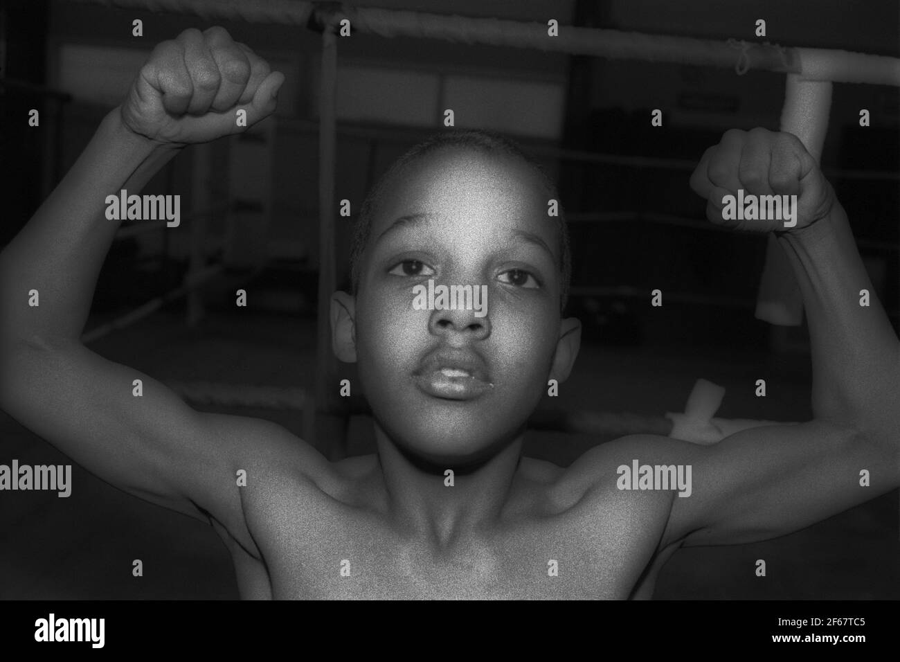 Fists in the air Black and White Stock Photos & Images - Alamy