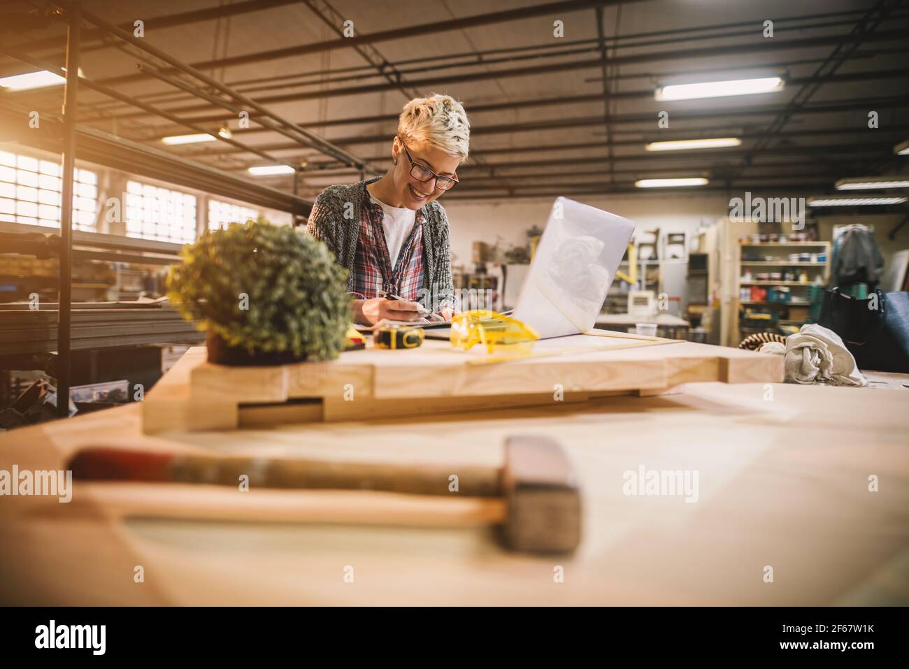 Charming smiling motivated short hair attractive middle aged industrial ...