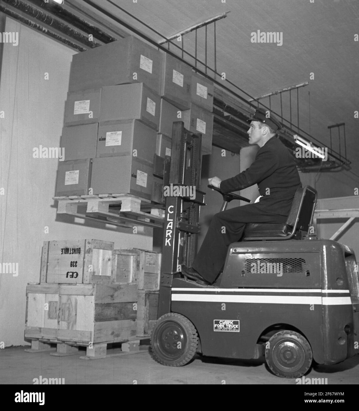 Goods handling with truck Stock Photo - Alamy