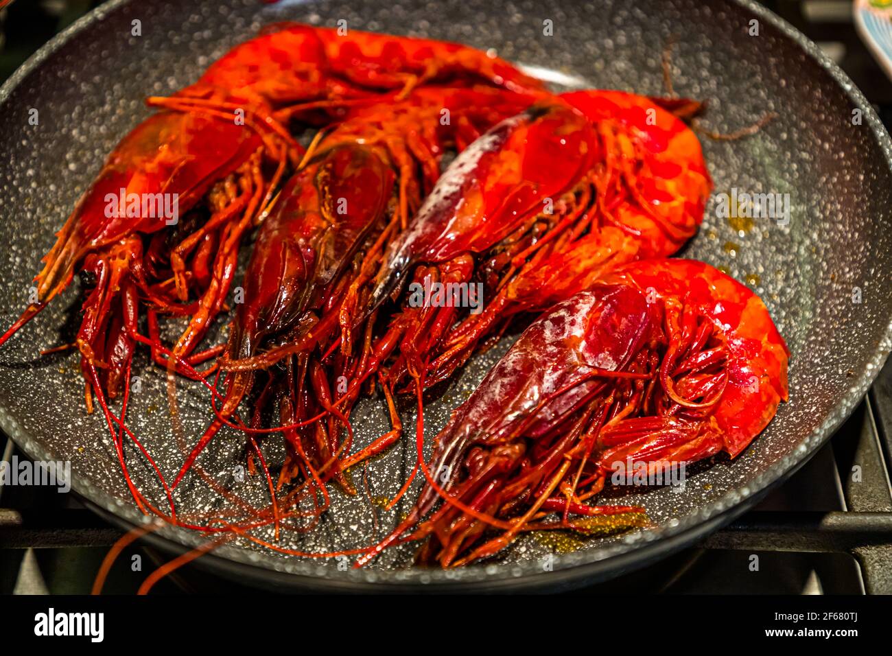Carabineros, the red king prawns in the pan. Grevenbroich, Germany ...