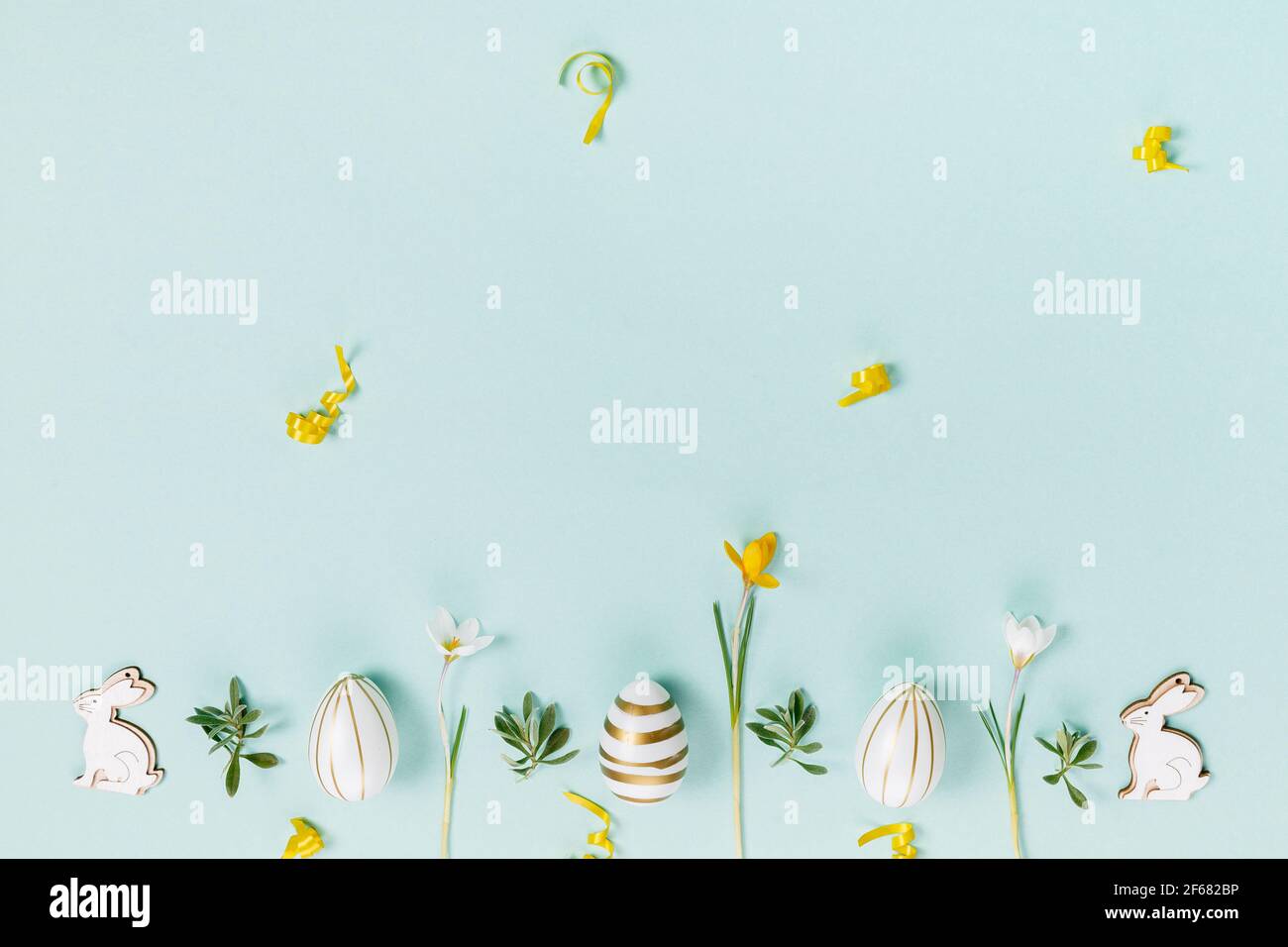 Festive Easter border, frame from easter eggs and spring flower crocus ...