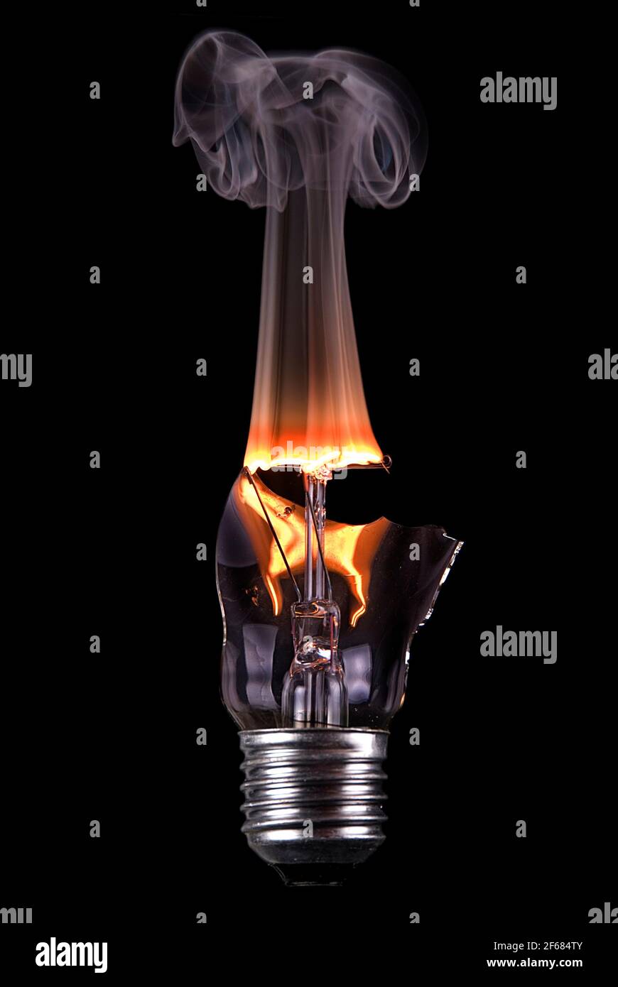 bulb blowing up by power consumption Stock Photo - Alamy