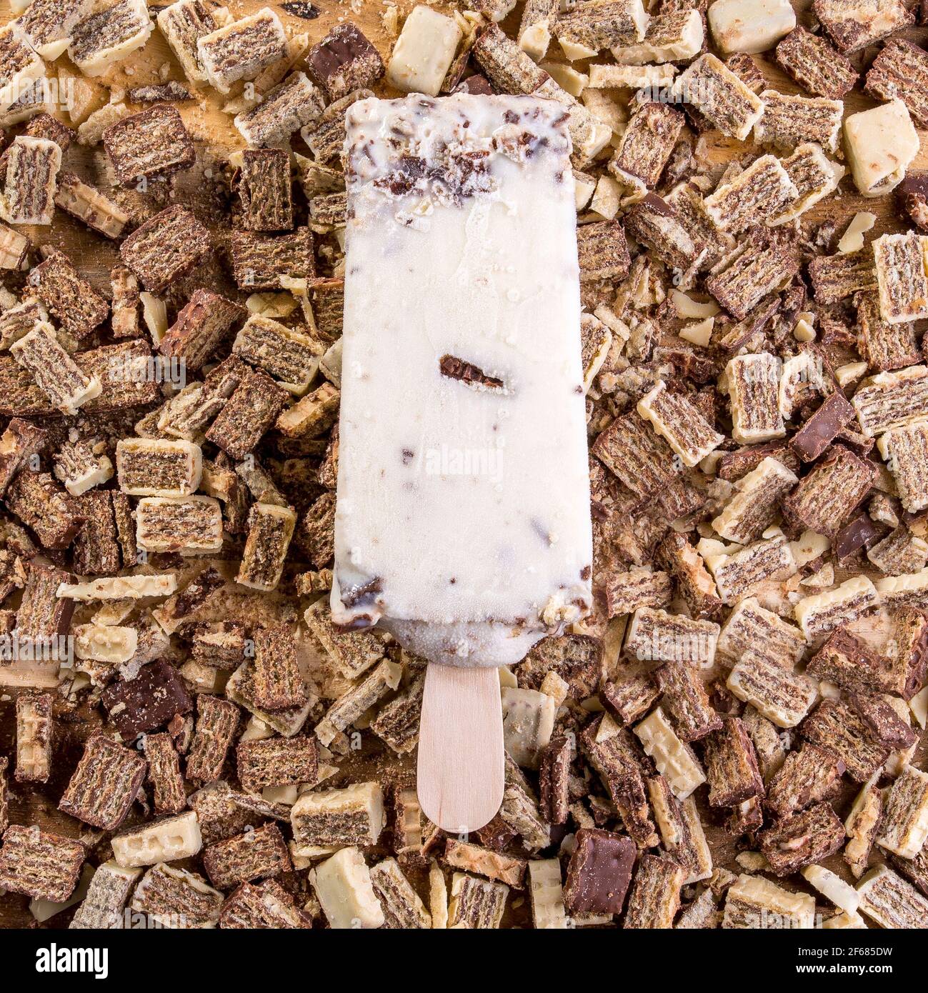Chocolate candy popsicle, mexican paleta, on candy crumbs Stock Photo ...