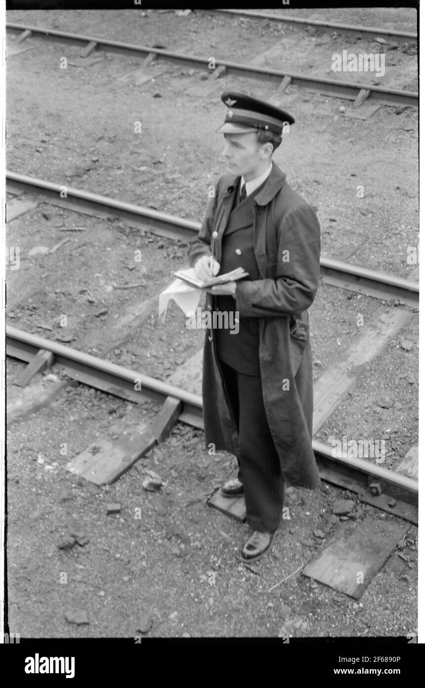 Railway staff at rail yard Stock Photo - Alamy