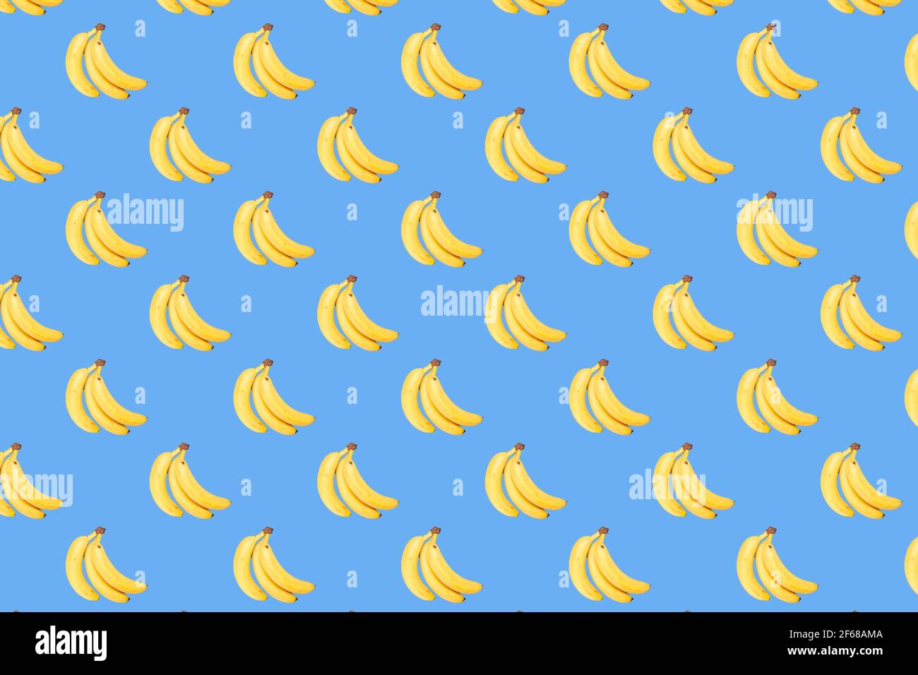 seamless pattern of bananas on light blue background Stock Photo - Alamy