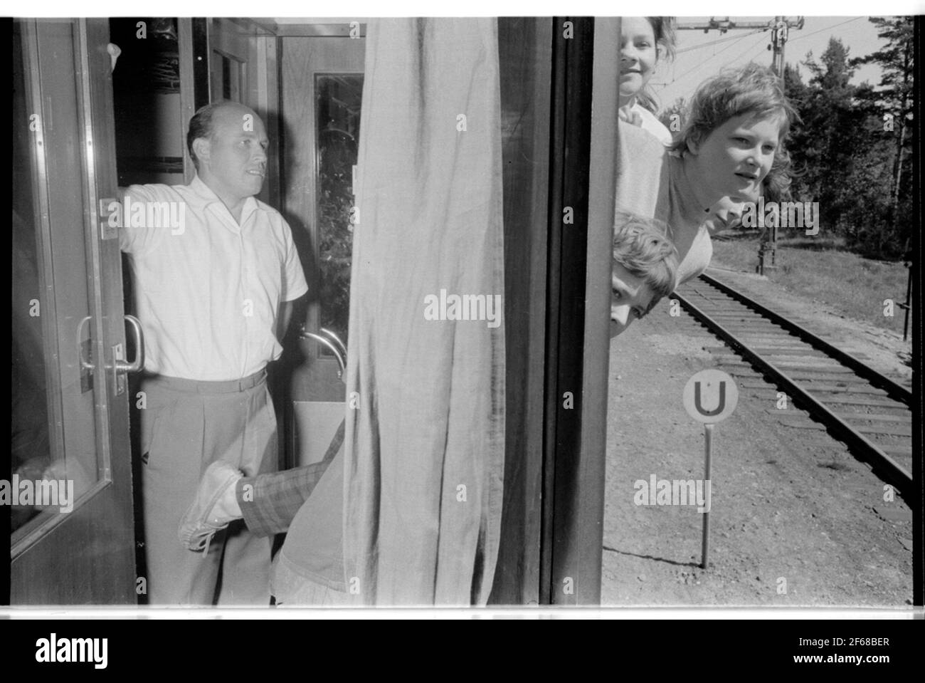 Passengers leaning out the train windows hi-res stock photography and ...