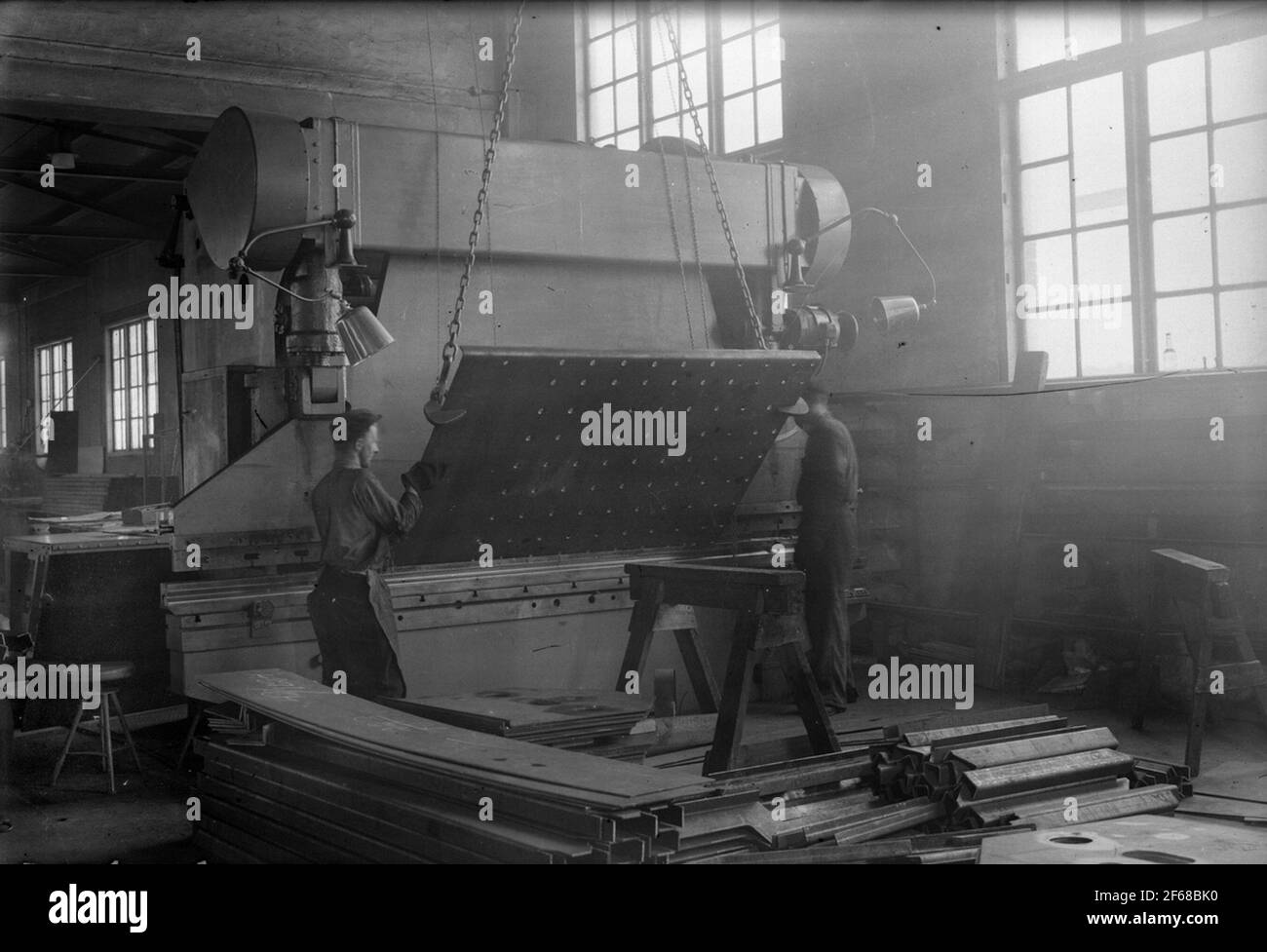 Edge press in work Dept. P Stock Photo - Alamy