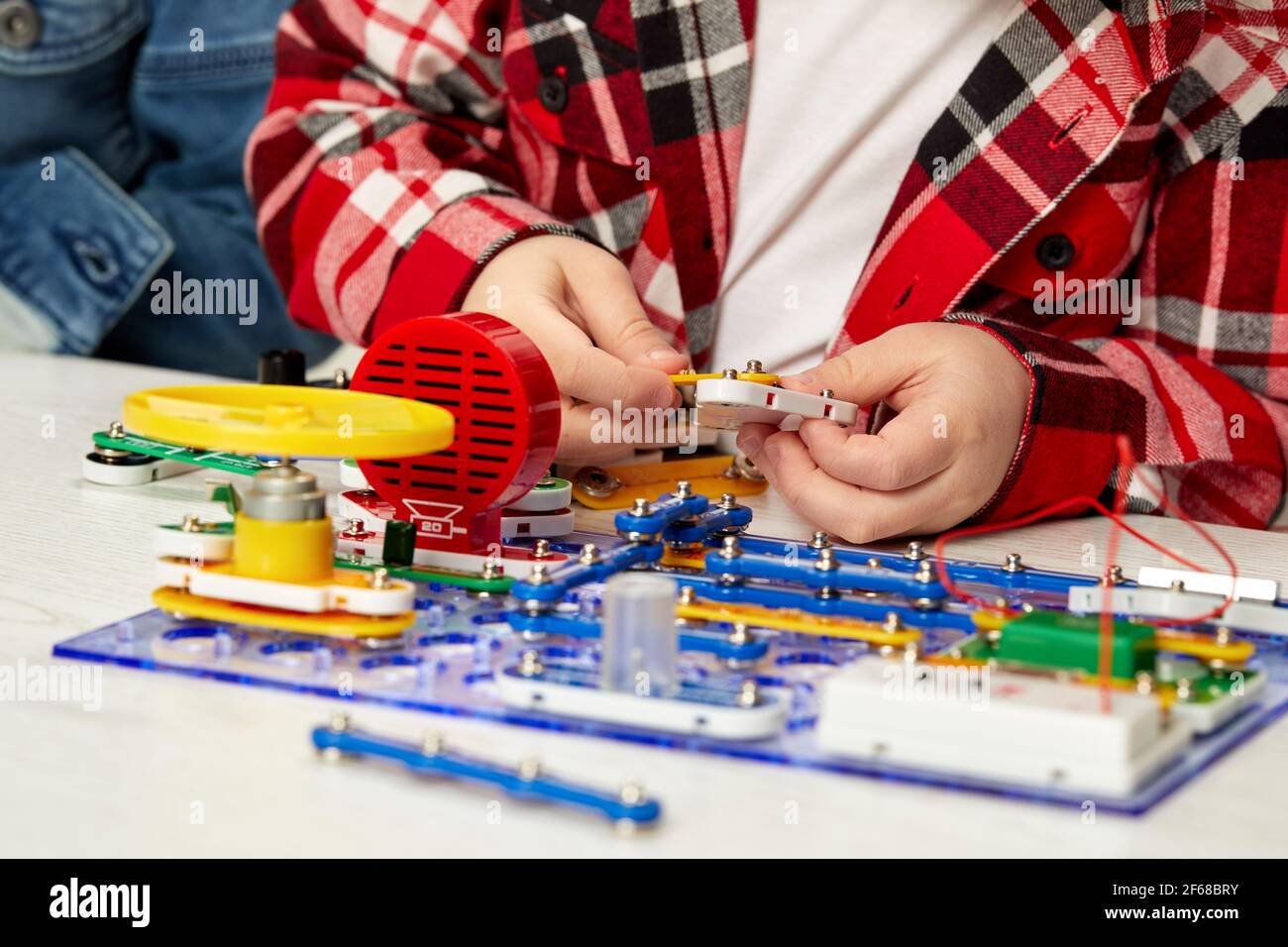 children playing with electronic constructor at studio Stock Photo - Alamy