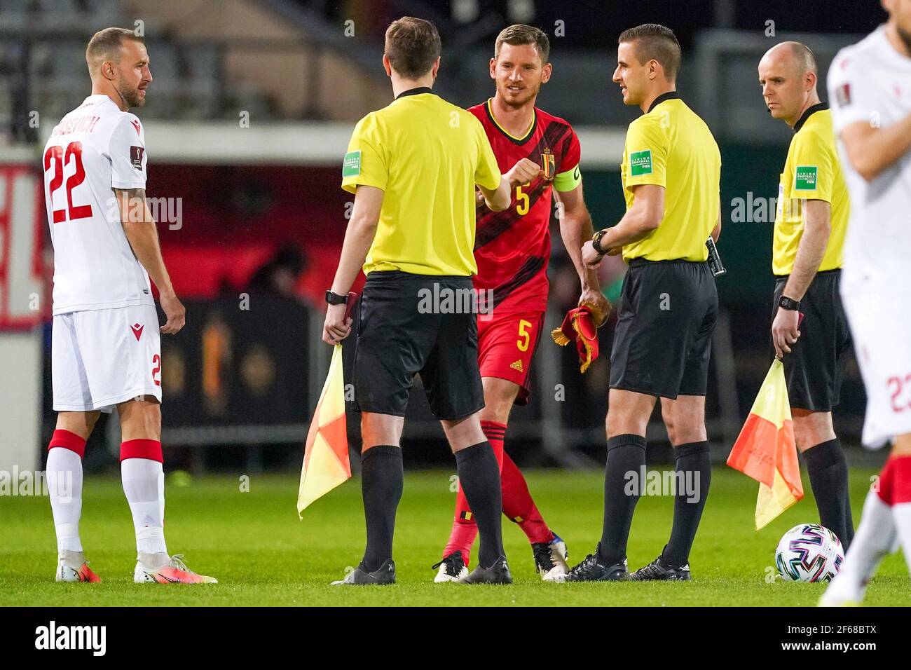 LEUVEN, BELGIUM - MARCH 30: Igor Stasevich of Belarus, Jan Vertonghen ...