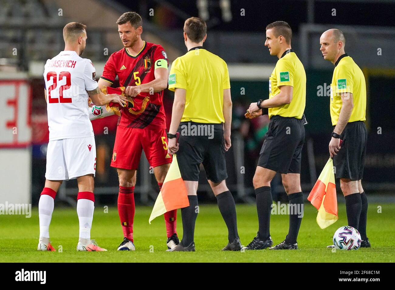 LEUVEN, BELGIUM - MARCH 30: Igor Stasevich of Belarus, Jan Vertonghen ...