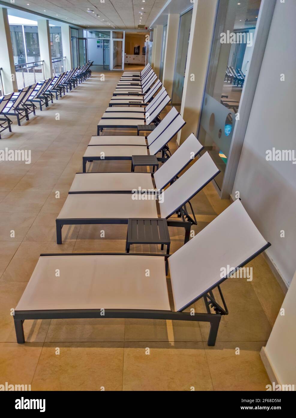 Beds in the line in the wellness center Stock Photo - Alamy