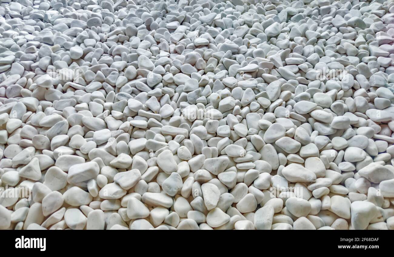 White stones on the ground Stock Photo - Alamy