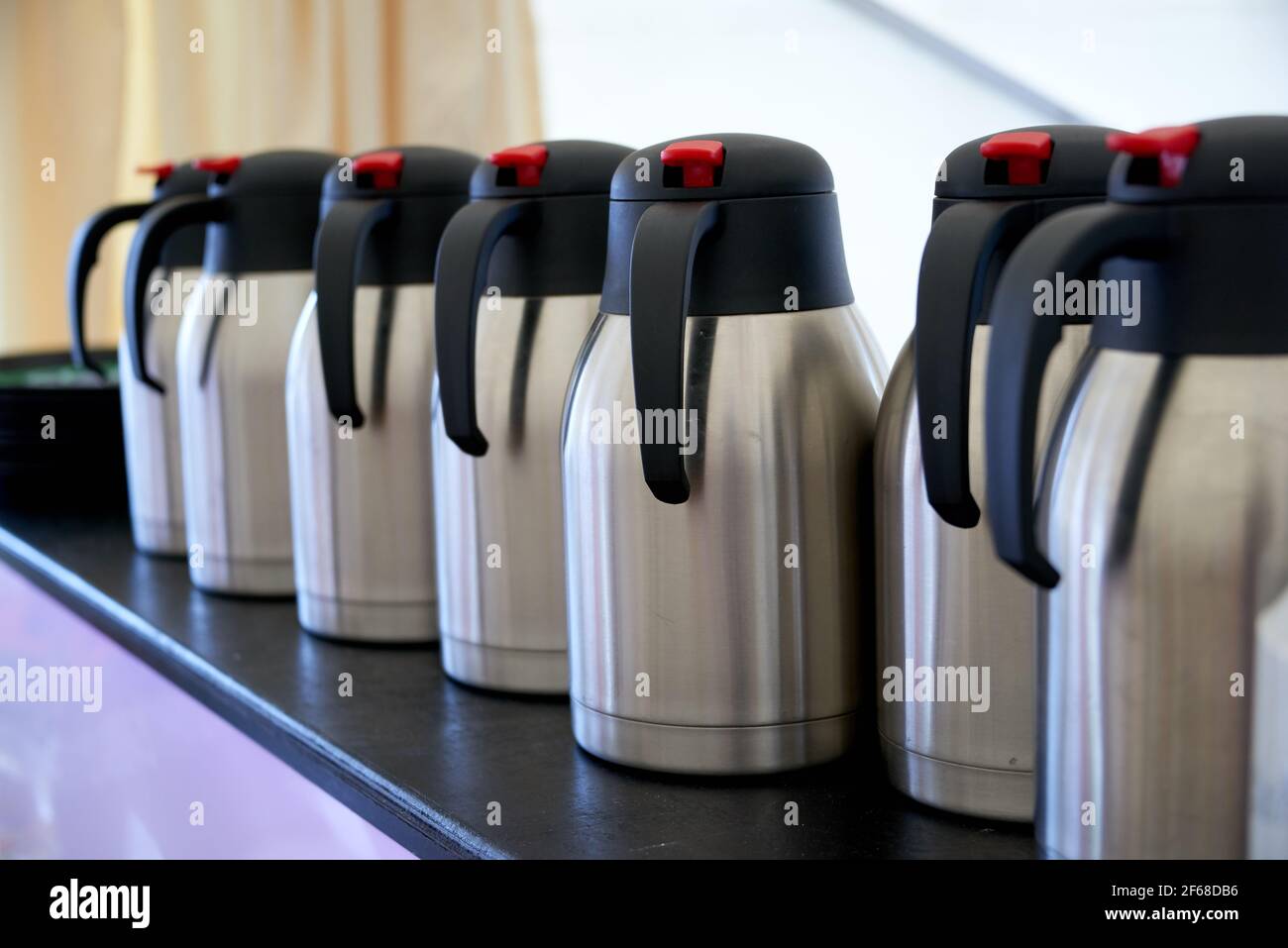 many coffee pots in a row Stock Photo - Alamy
