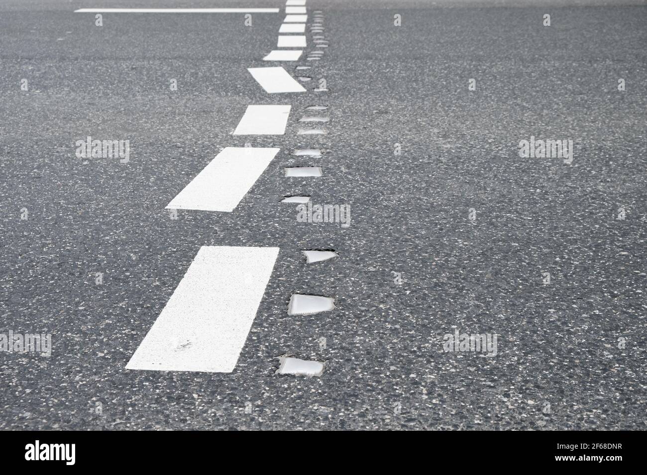 deranged road markings on asphalt Stock Photo - Alamy