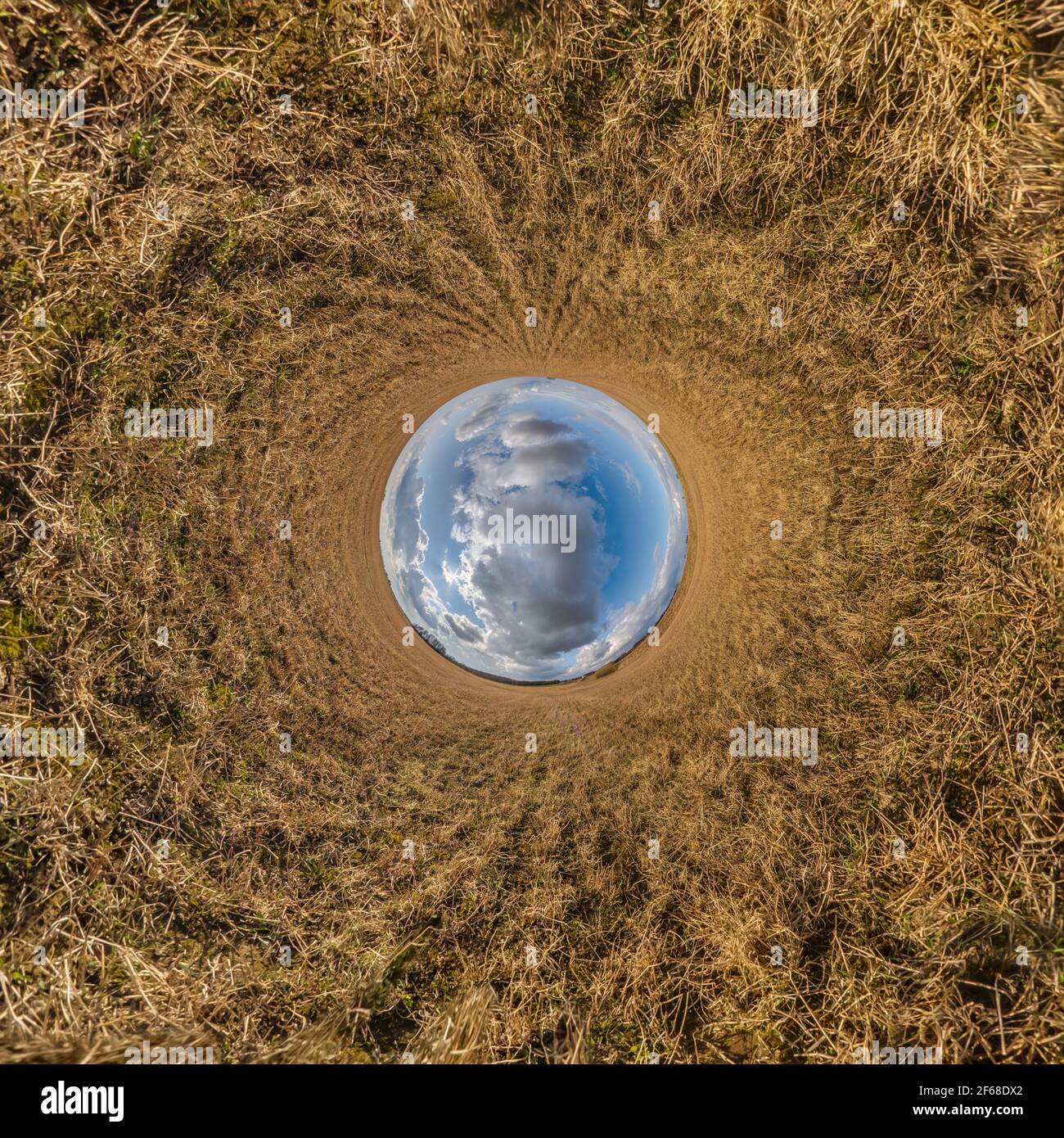 blue sky ball in middle of swirling field. Inversion of tiny planet ...