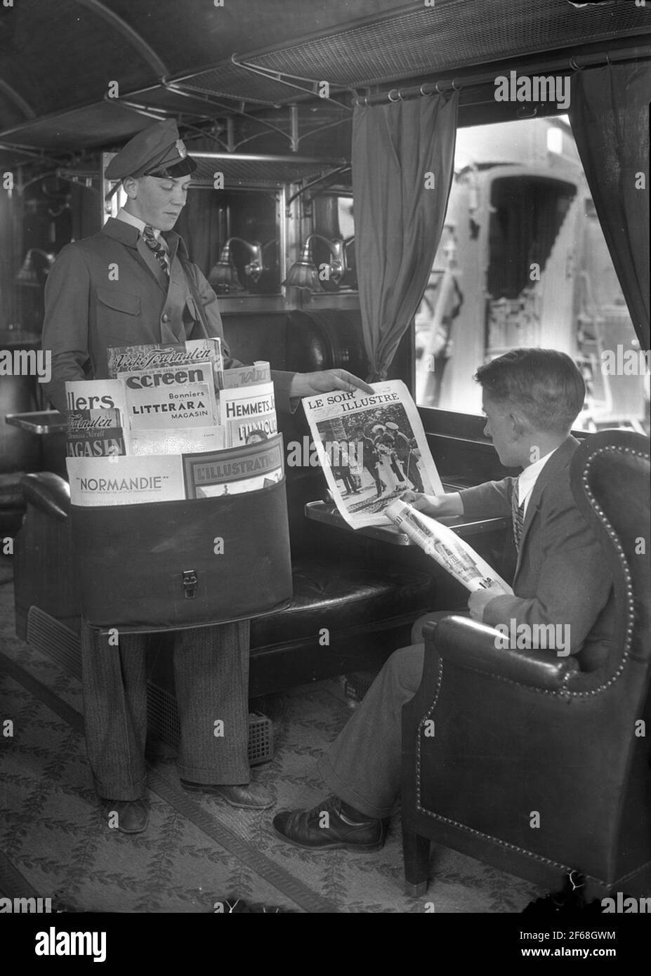 Newspaper sales on train, state railways, SJ BO5B Stock Photo - Alamy