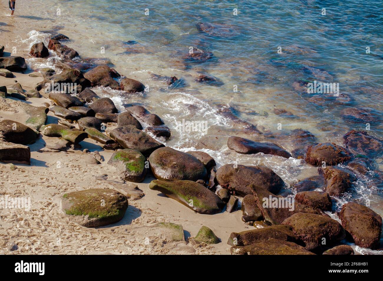 Rocky beach with splashing waves. Pacific ocean views Stock Photo - Alamy
