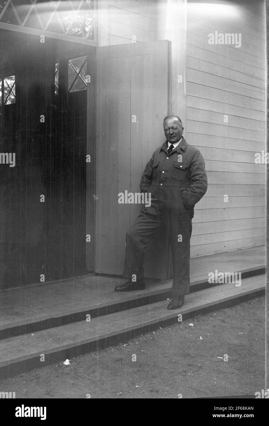 Exhibition man at the entrance Stock Photo - Alamy