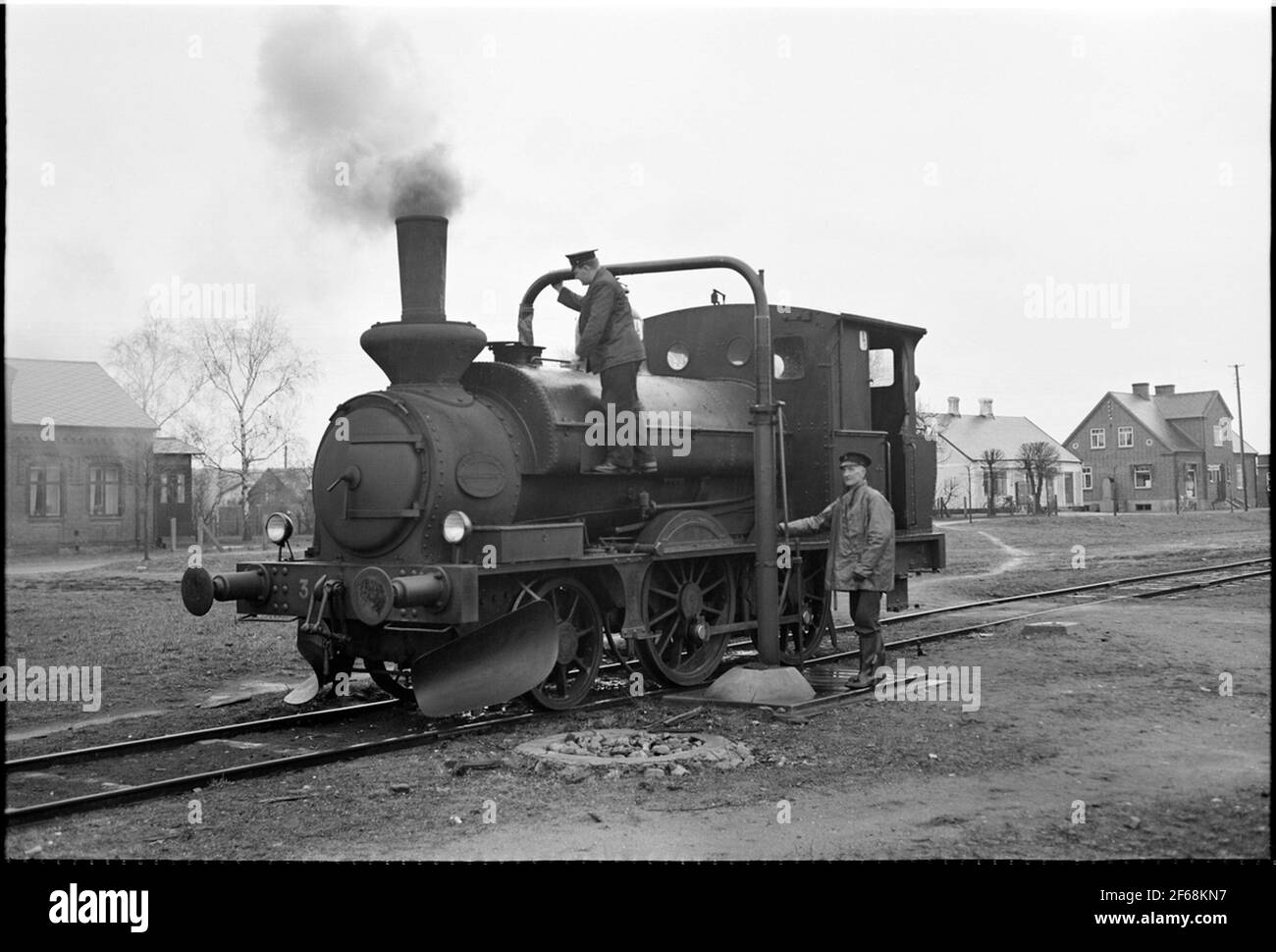 Steam train filling water hi-res stock photography and images - Alamy