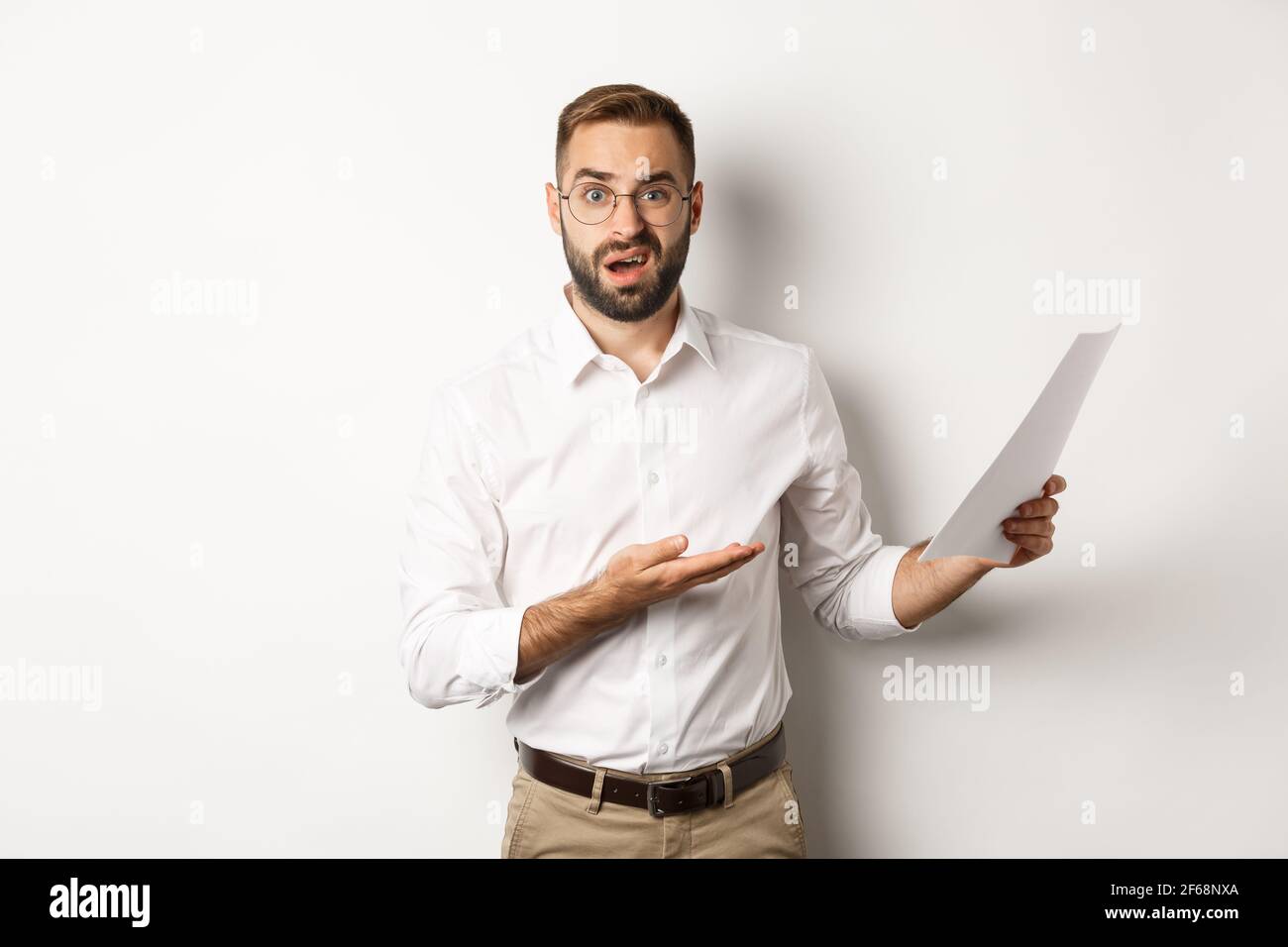 Confused businessman reading documents hi-res stock photography and ...
