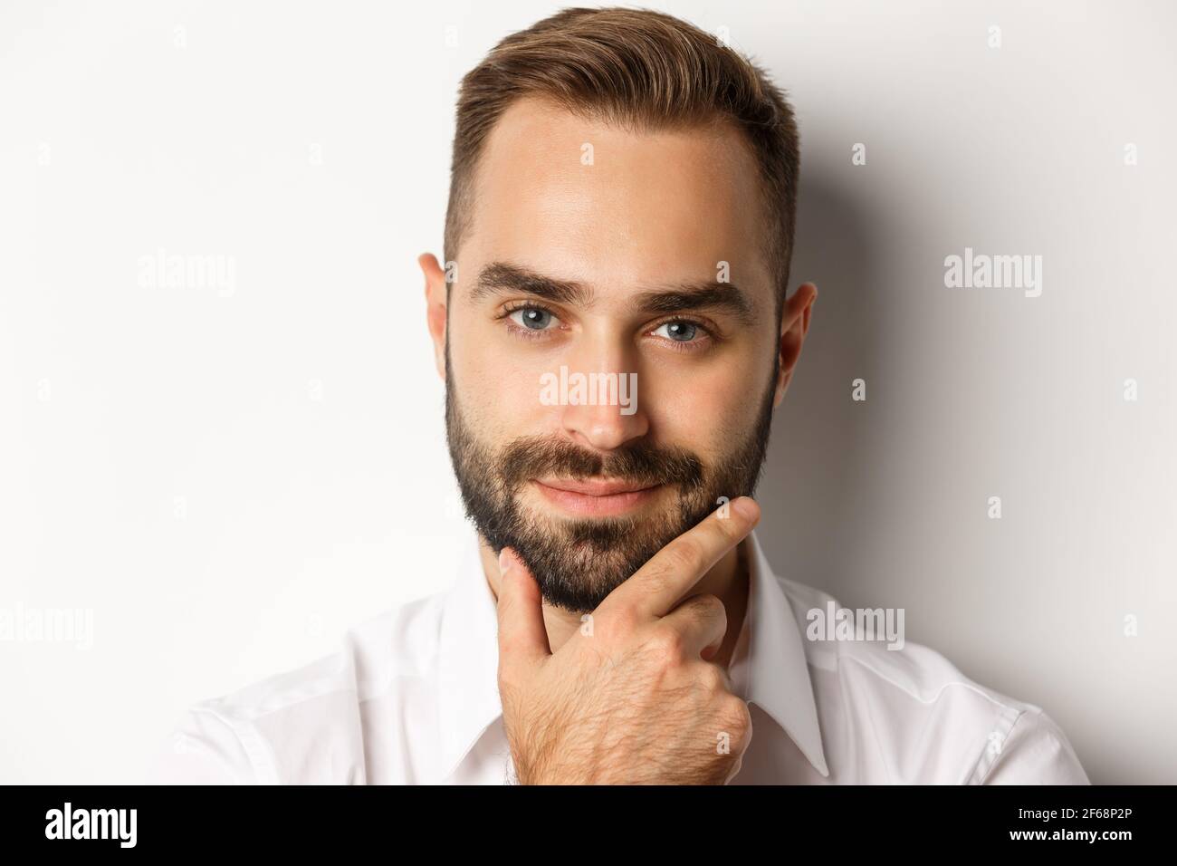 Emotions and people concept. Headshot of handsome thoughtful man ...
