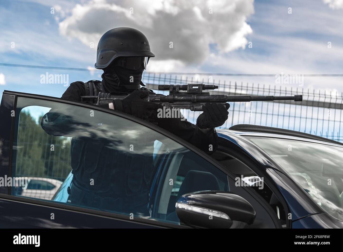 Masked soldier in a mask without stripes and identification marks ...