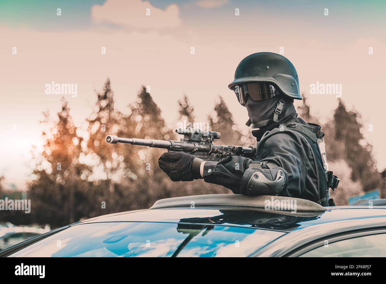 Masked soldier in a mask without stripes and identification marks ...