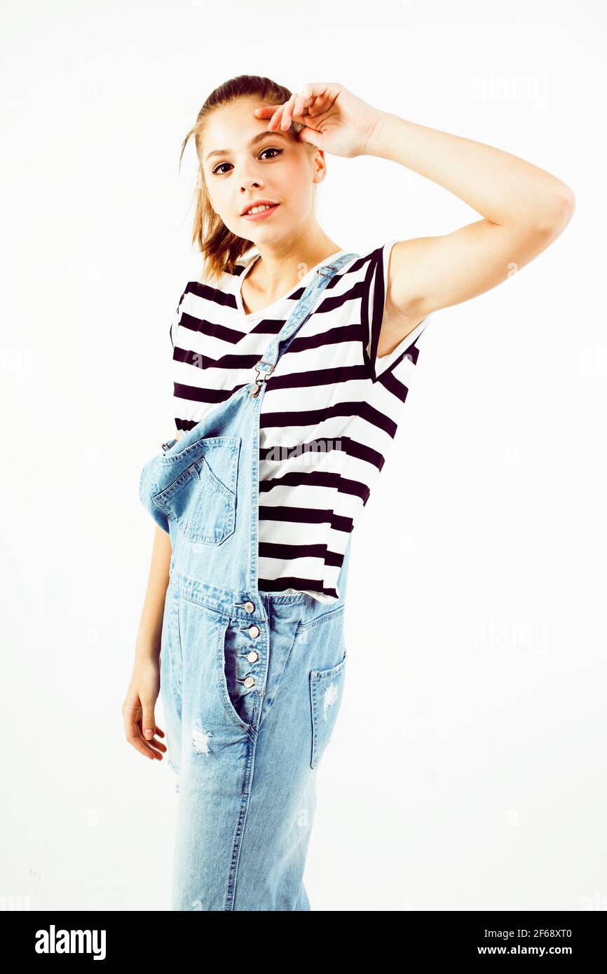 young pretty teenage hipster girl posing emotional happy smiling on ...