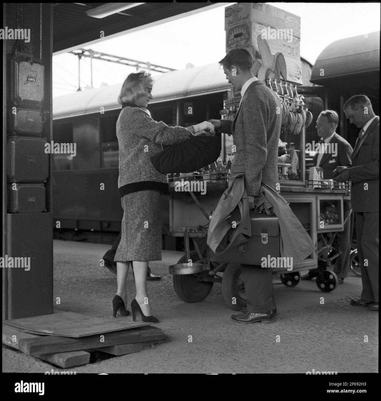 Traffic restaurant, TR, salesman with cart on platform Stock Photo - Alamy