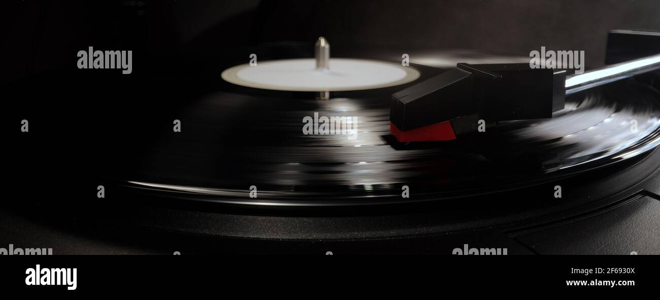 Amazing view over a record player playing a vinyl Stock Photo - Alamy