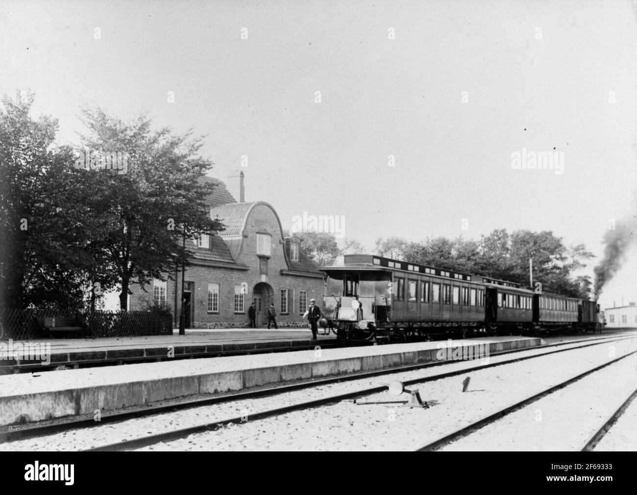 Åhus Stationchj trains. [Kristianstad-Hässleholm's railway] .f.d. SSNJ ...