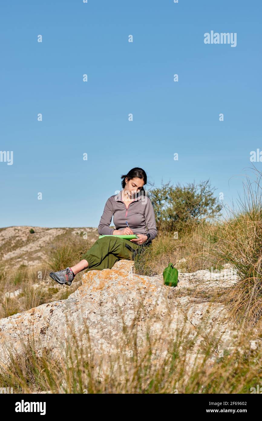 Geographer looking at map hi-res stock photography and images - Alamy