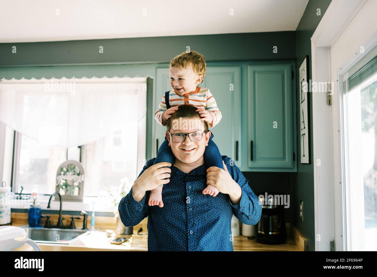 Father Holding Baby On Shoulders High Resolution Stock Photography and ...