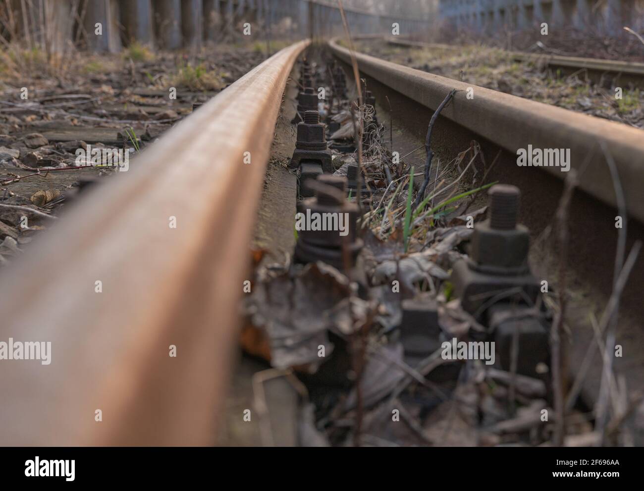 Old abandoned train station with rusty railroad tracks Stock Photo - Alamy