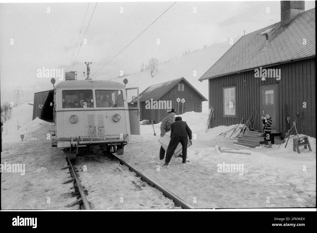 The rail bus driver Rof Wiklund helps with the relief of goods Stock ...