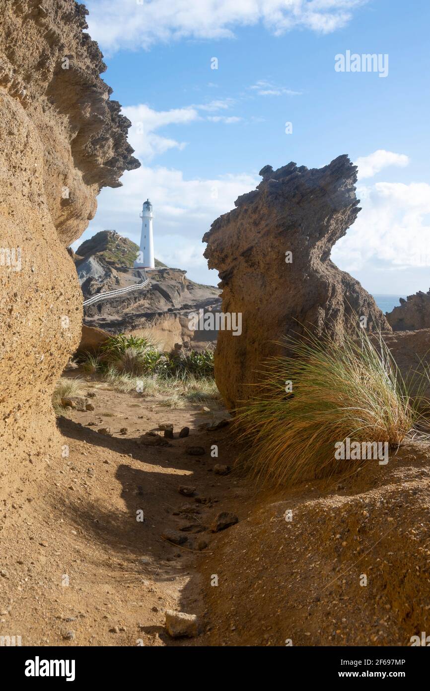 Rock formation and lighthouse, Castlepoint, Wairarapa, North Island ...