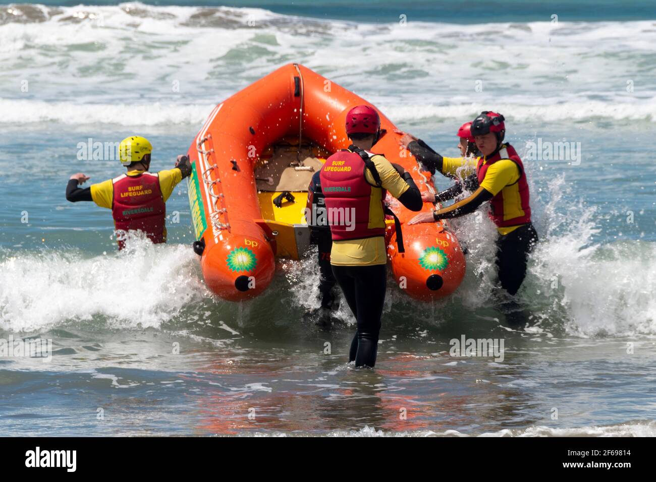 Surf lifesavers and rescue boat at Riversdale beach, Wairarapa, North ...