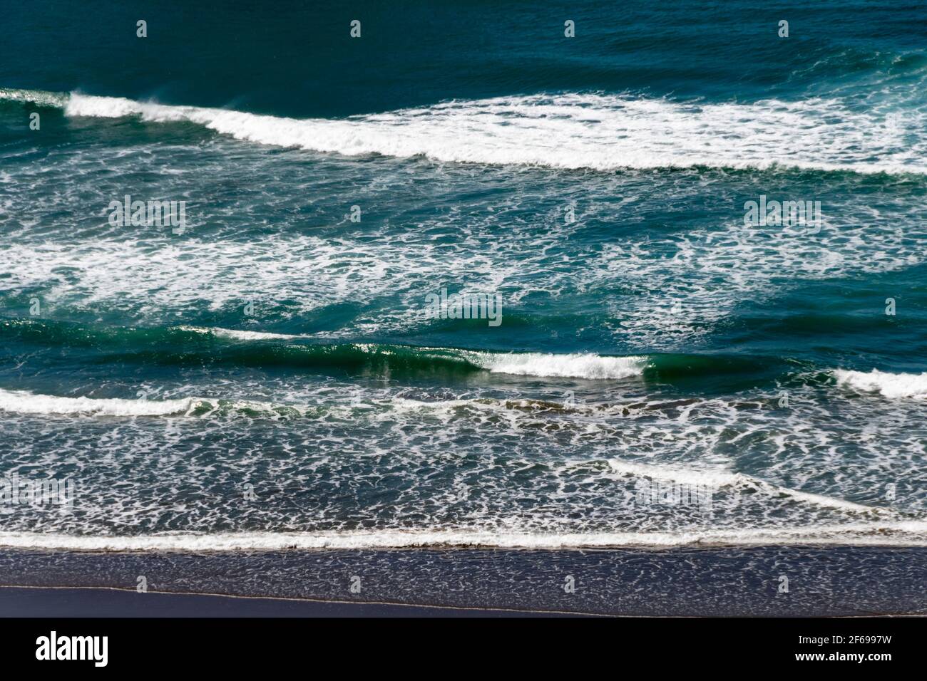 Breaking waves on the beach at Castlepoint, Wairarapa, North Island ...