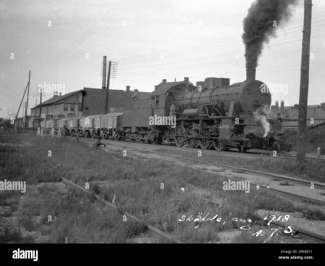 State Railways, SJ GA 1425 with freight wagons Stock Photo - Alamy