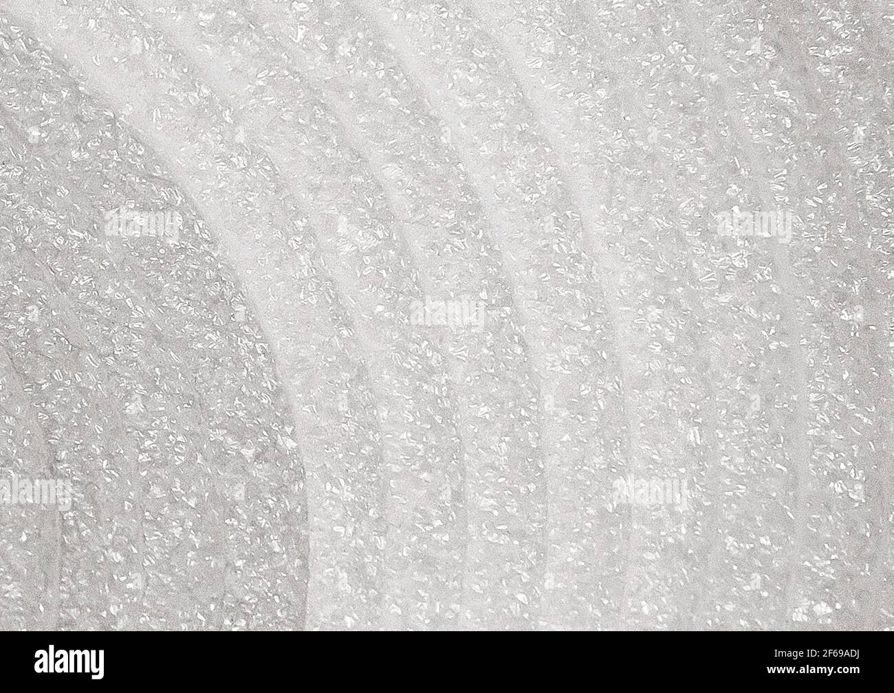 White foam in a roll close-up, building, insulation material texture ...